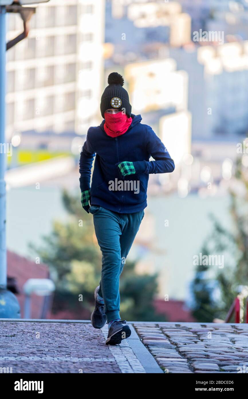 boy running upstairs with home made surgical mask Stock Photo - Alamy