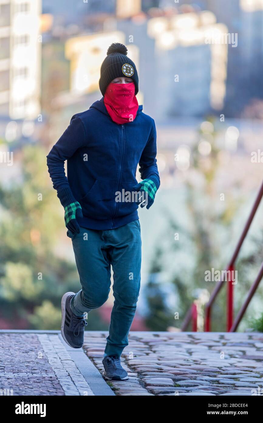 boy running upstairs with home made surgical mask Stock Photo - Alamy