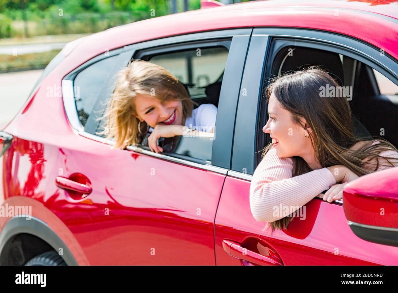 Girls hand out car window hi-res stock photography and images - Alamy