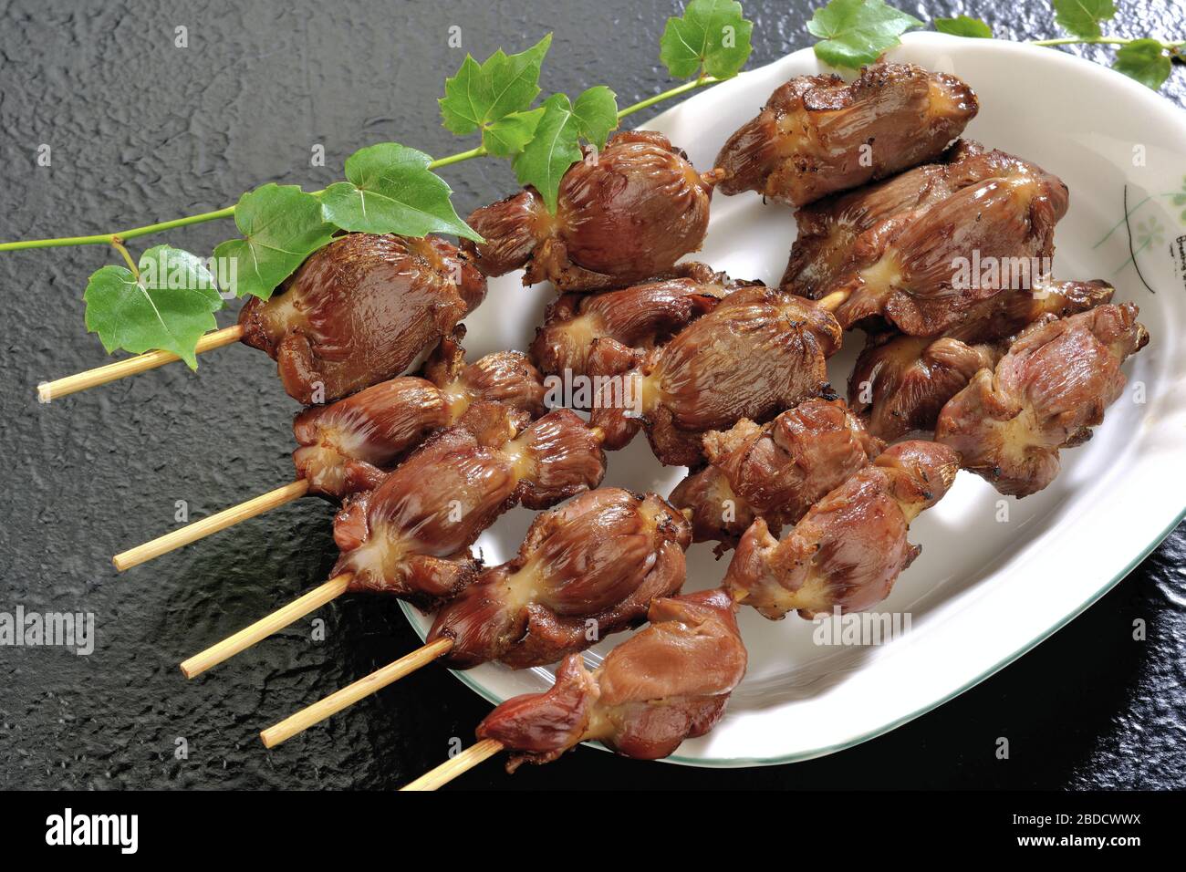 Chickens gizzard kabob Stock Photo - Alamy