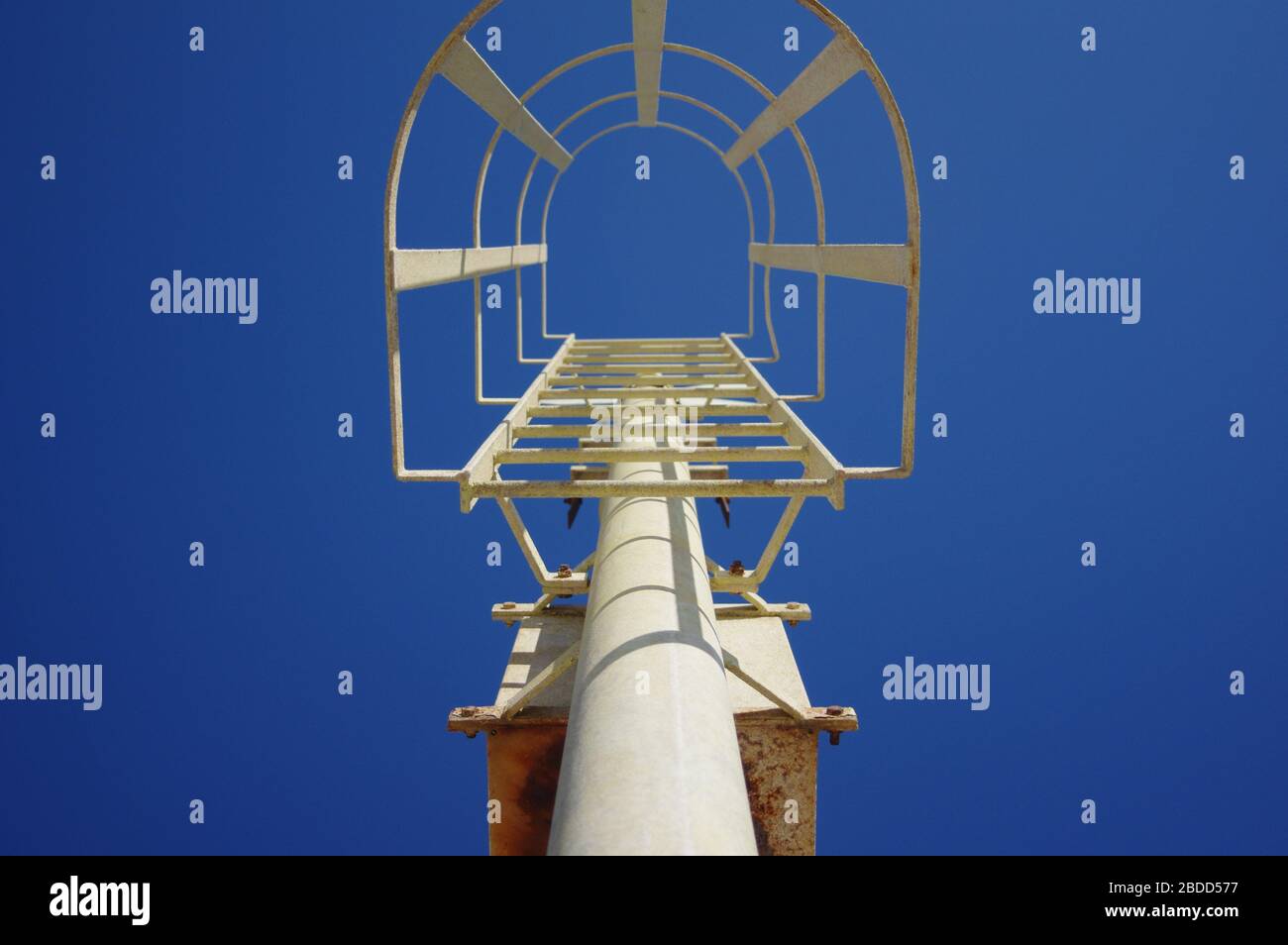 Old steel stair steps to the top of tower Stock Photo - Alamy