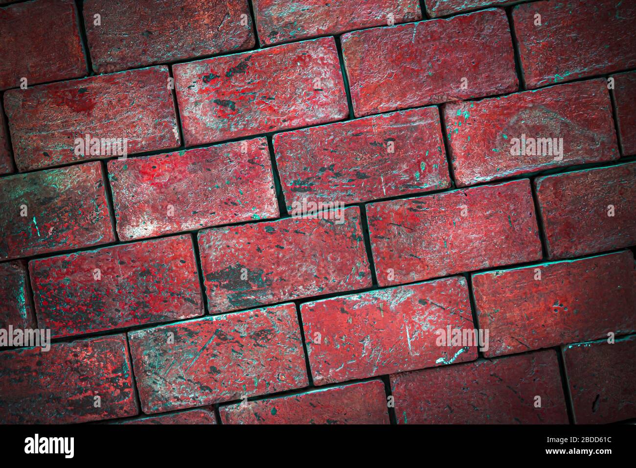 brick wall of red blocks with a slope of masonry and a vignette ...