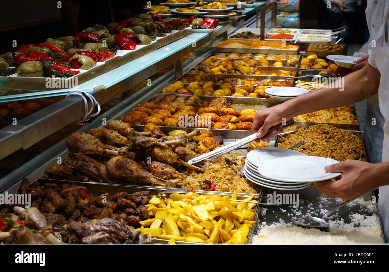 Artisan Restaurant, kitche. buffet dinner celebration party. Cook ...
