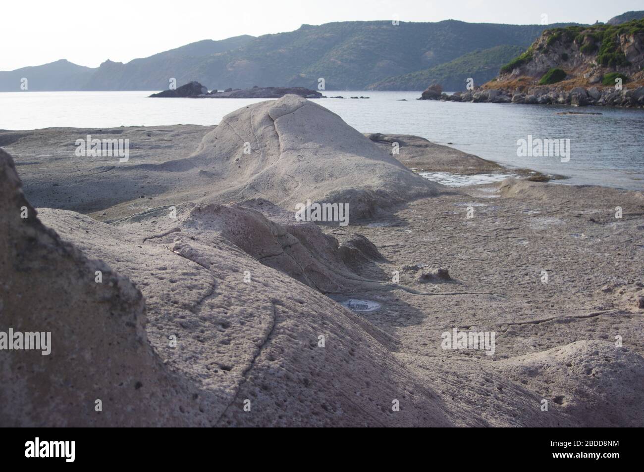 Huge grey rocks on the coast of the Mediterranean Sea in Sardinia ...