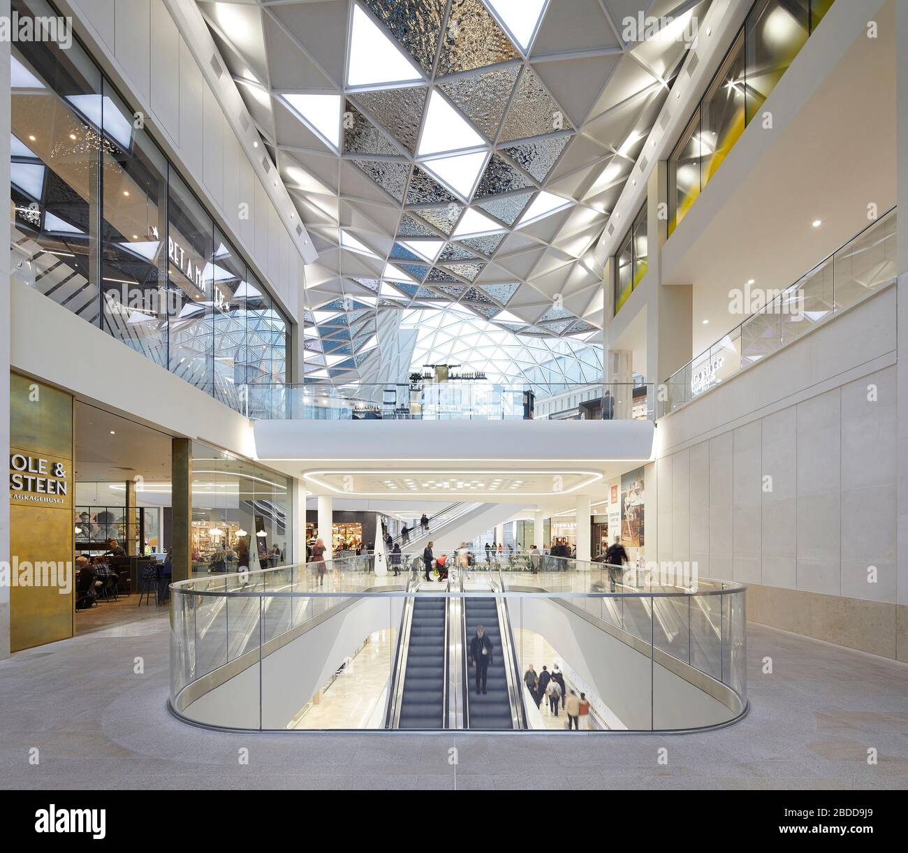 Multi-level shopping streets beneath skylight. Westfield White City ...