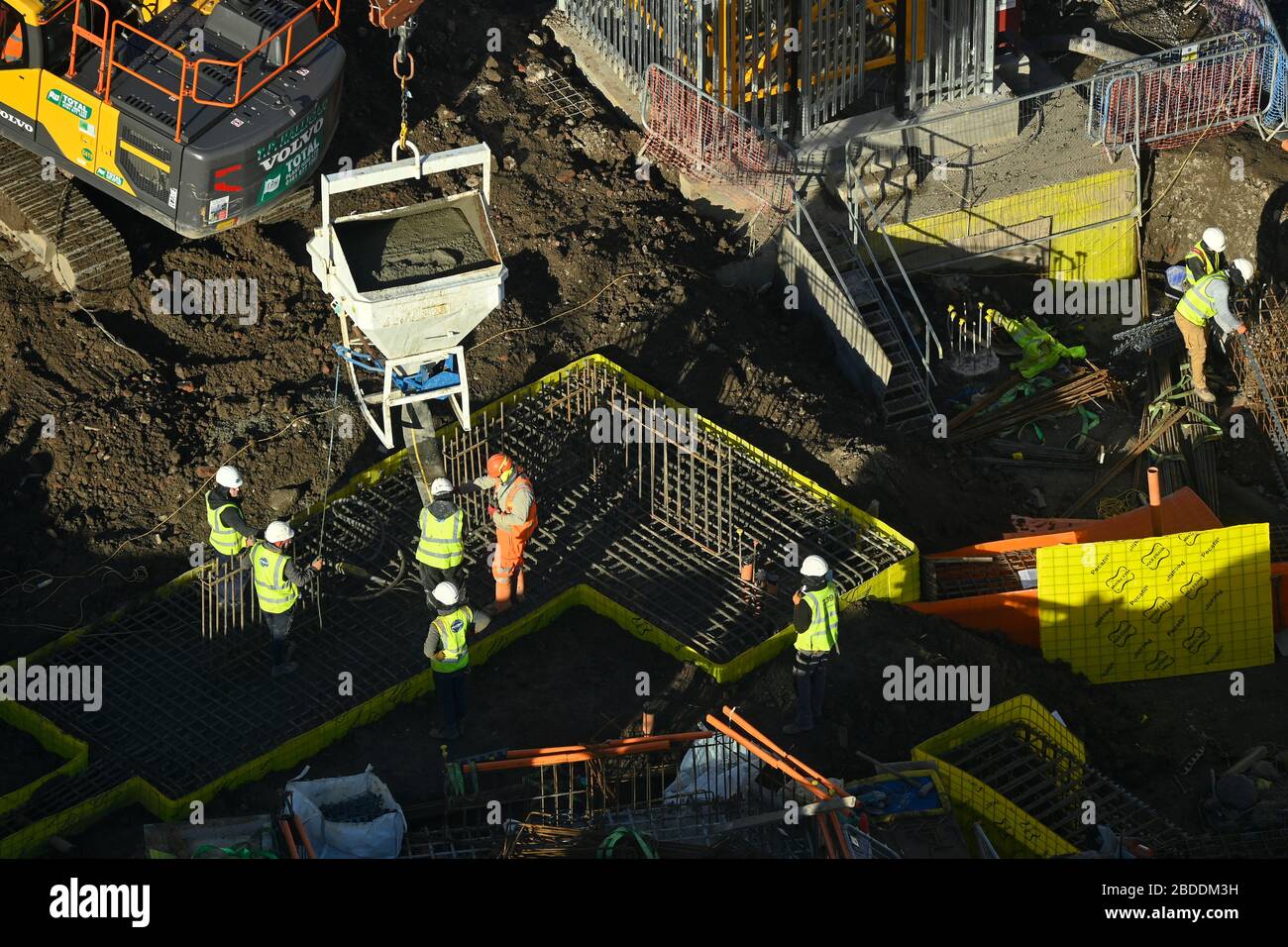 Construction workers on building site England Stock Photo - Alamy