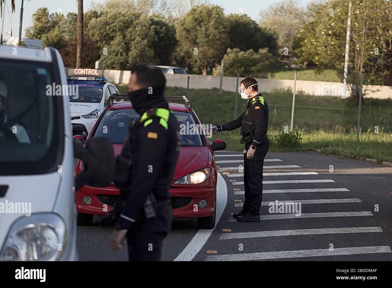 Barcelona, Spain. 08th Apr, 2020. police officers control traffic at ...