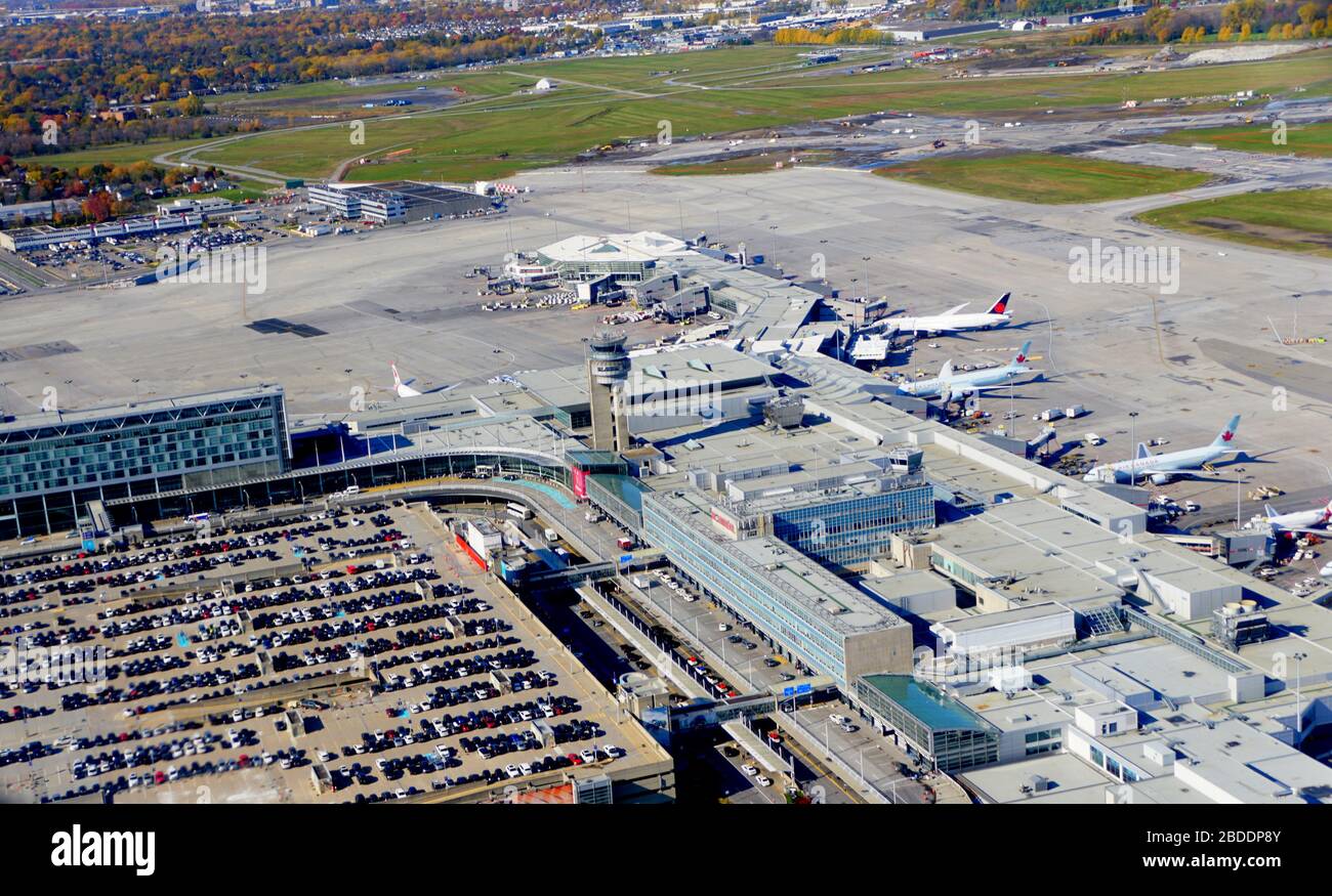 Montreal, Canada - October 28, 2019 - The aerial view of the terminals and planes near Pierre ...