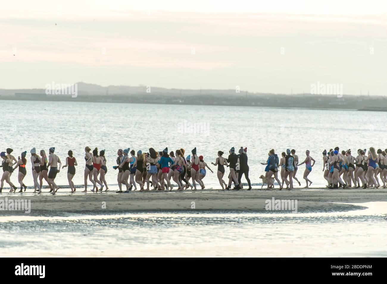 Up to 500 women take part in a sunrise swim at Portobello beach in ...