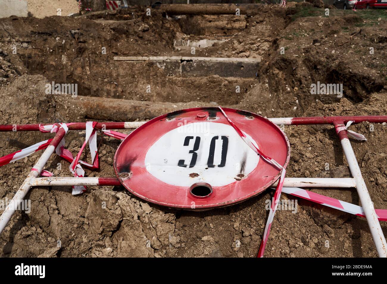 the road sign for the speed limit of thirty kilometers or miles per ...