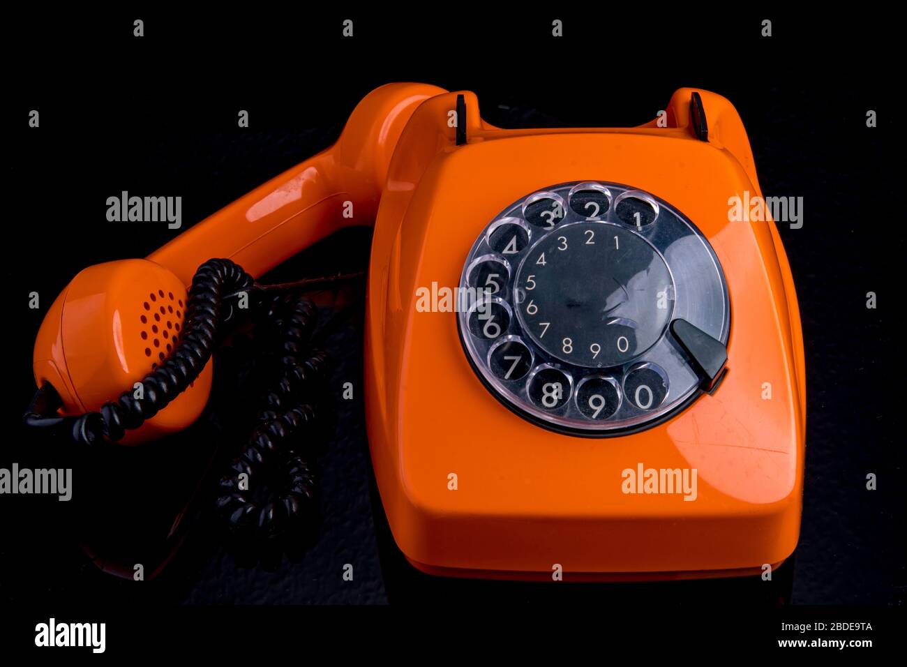 calling with an old retro phone Stock Photo - Alamy