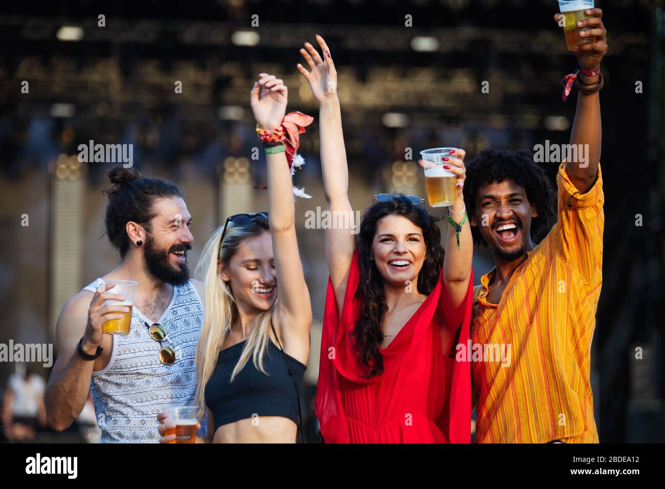 Happy friends laughing and having fun outdoors Stock Photo - Alamy