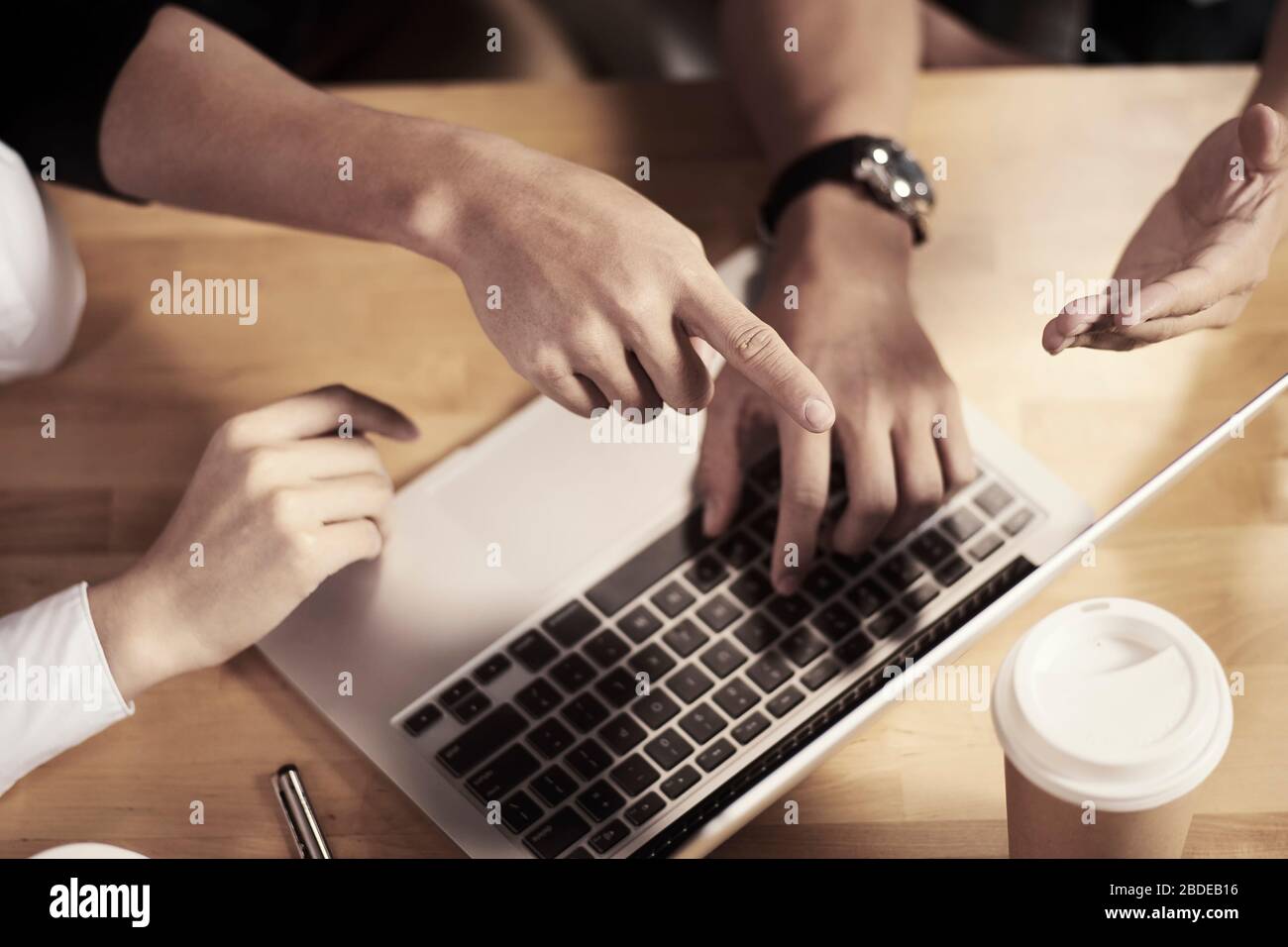 People together laptop in hi-res stock photography and images - Alamy
