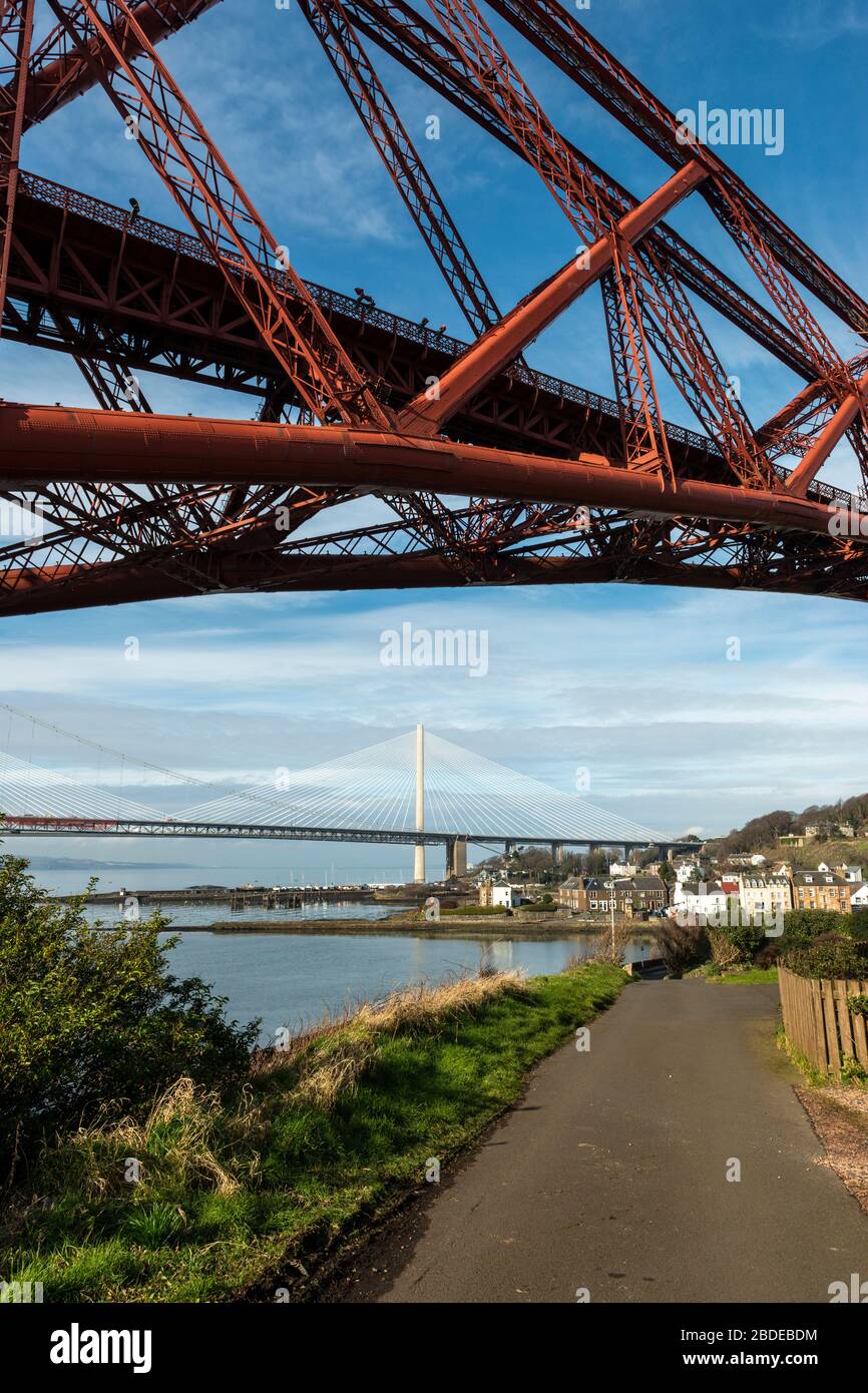 View under span of Forth Rail Bridge with Forth Road Bridge and ...