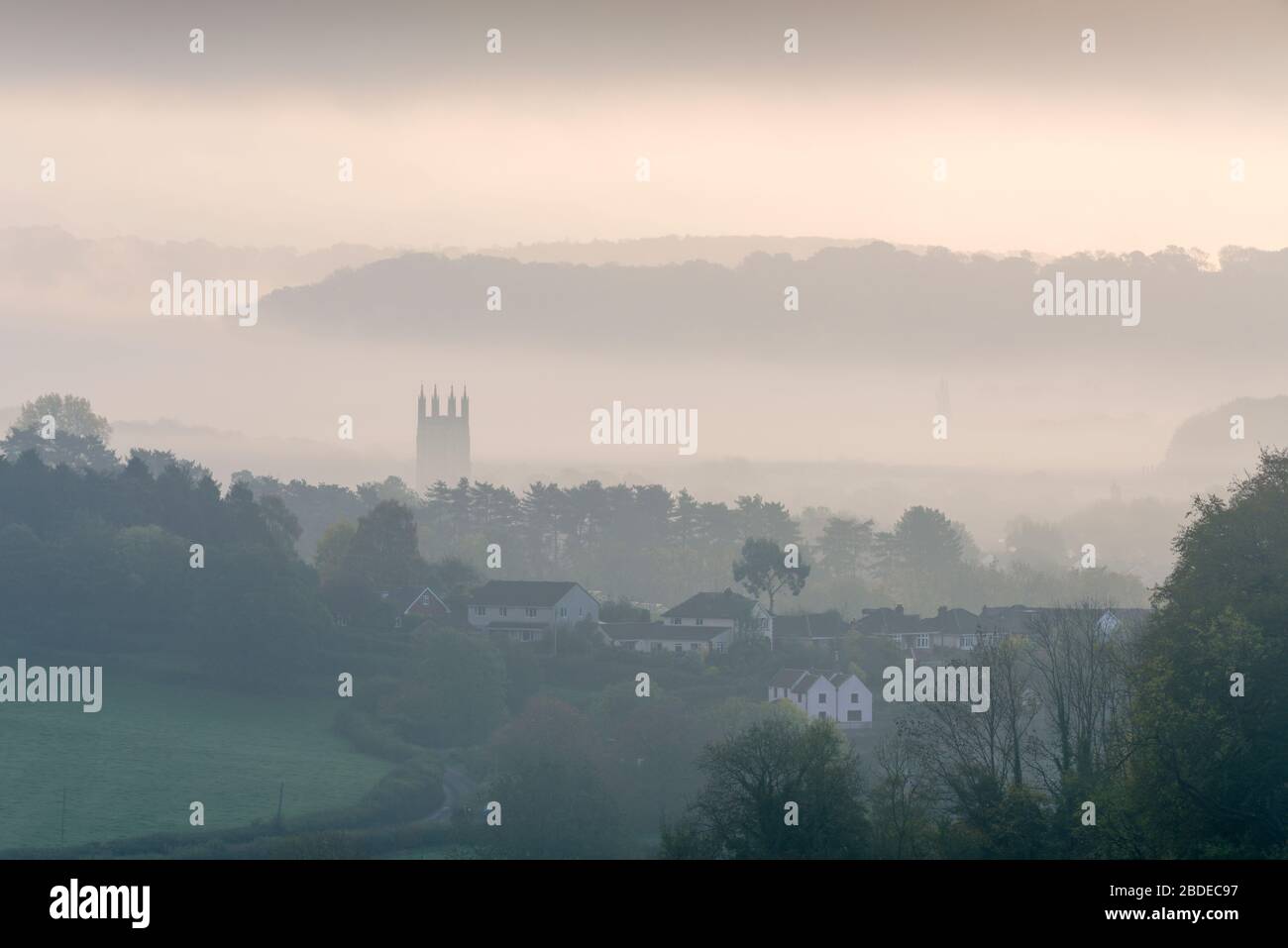Morning mist over the City of Wells and the tower of St Cuthebert's ...