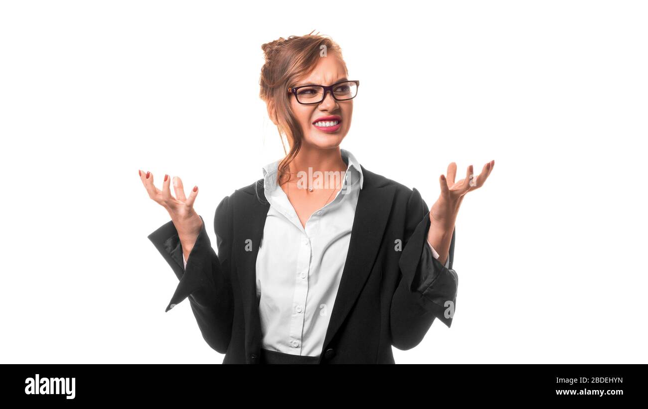 Young angry confused businesswoman screaming and keeps hands up with ...