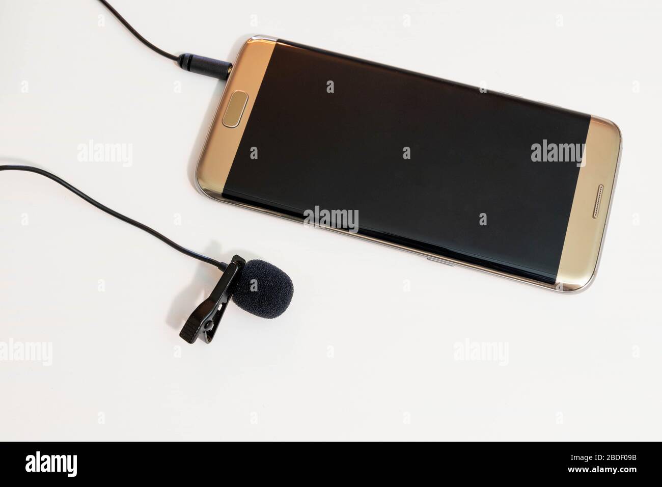 Miniature microphone hi-res stock photography and images - Alamy