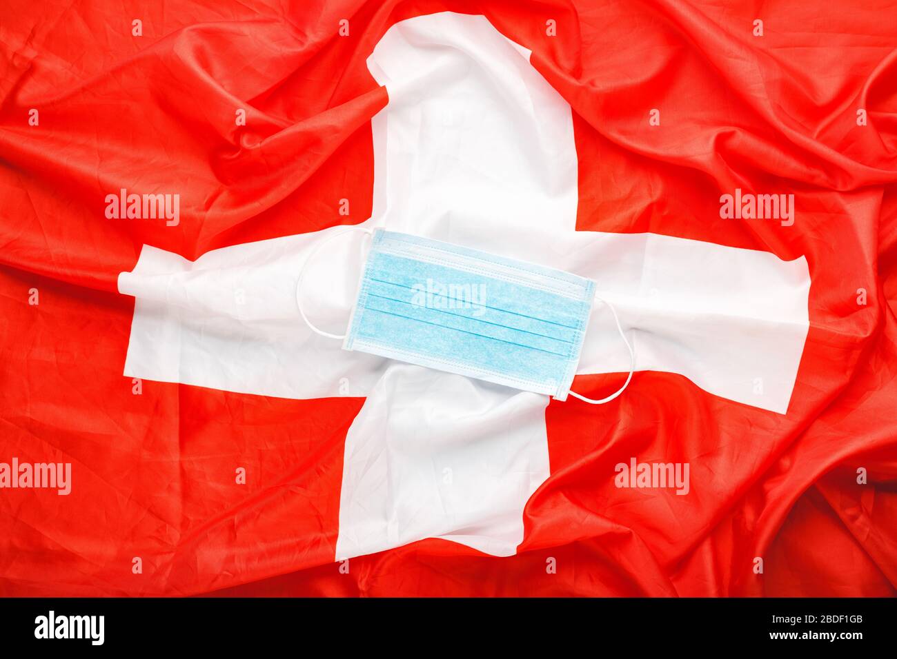 Swiss flag face mask hi-res stock photography and images - Alamy