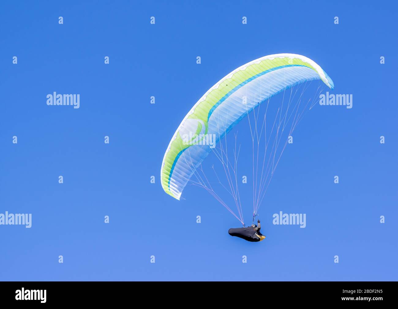 Person paraglider flying in air hi-res stock photography and images - Alamy