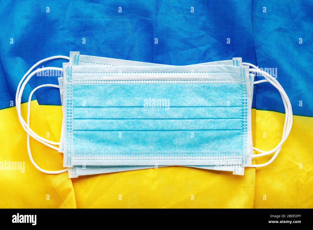 Coronavirus in Ukraine. Protective surgical face mask on Ukrainian ...