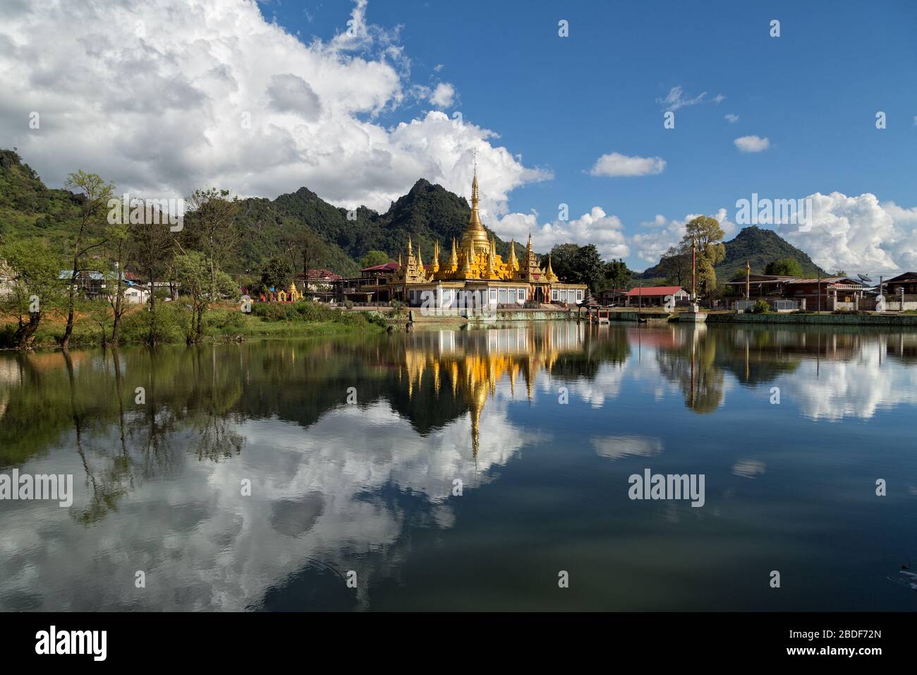 A breathtaking view to a Floating Pagoda at sunrise. Indawgyi Lake ...
