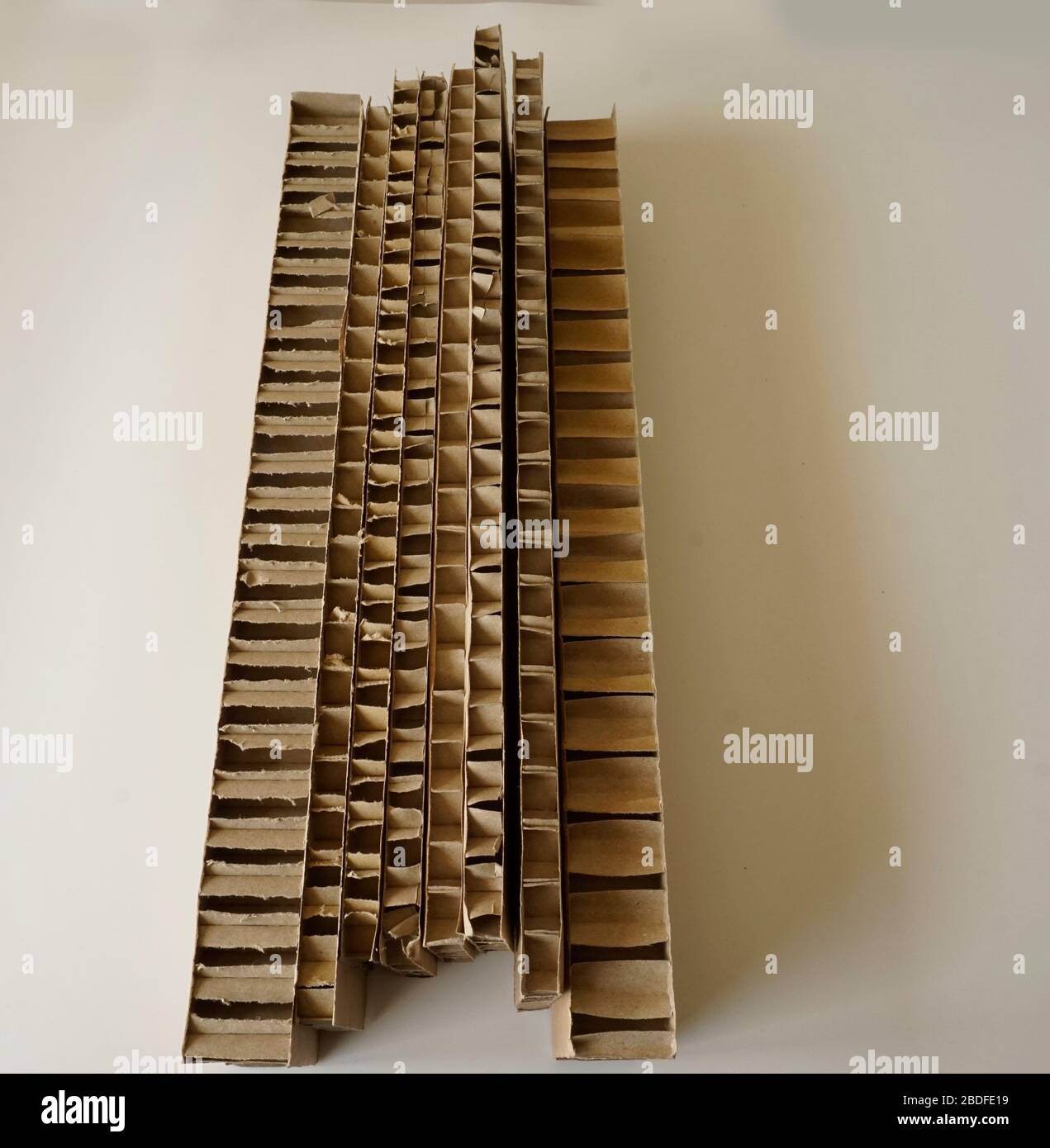 Sheets of brown corrugated cardboard used for filling in fragile ...