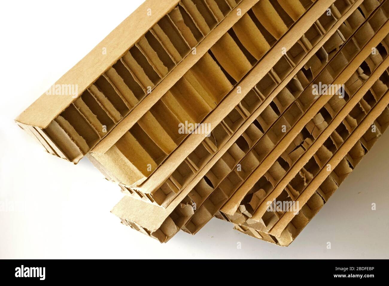 Sheets of brown corrugated cardboard used for filling in fragile parcels. Rigid double wall ...