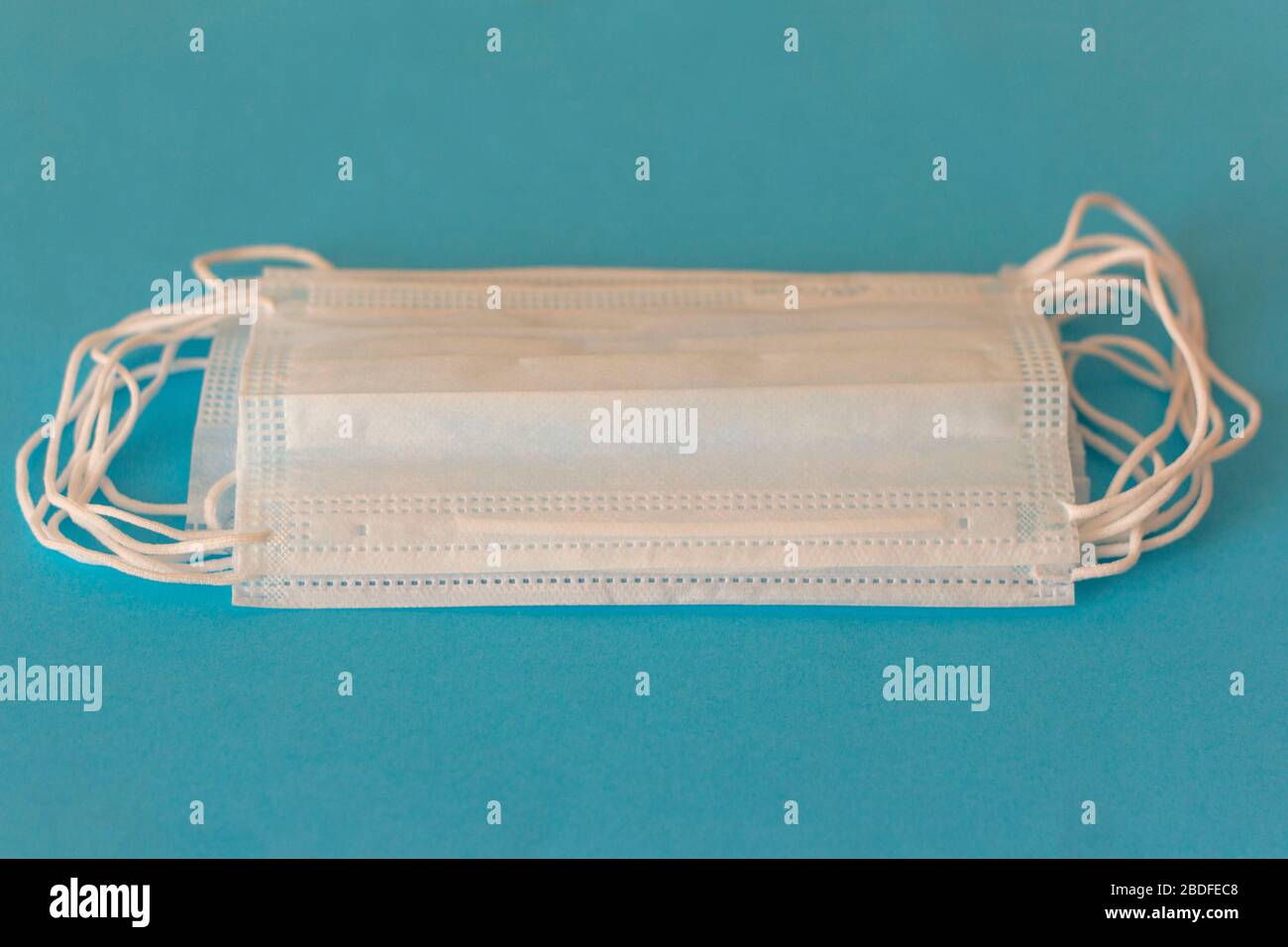 Antiviral medical mask to protect against infections. A pack of medical ...