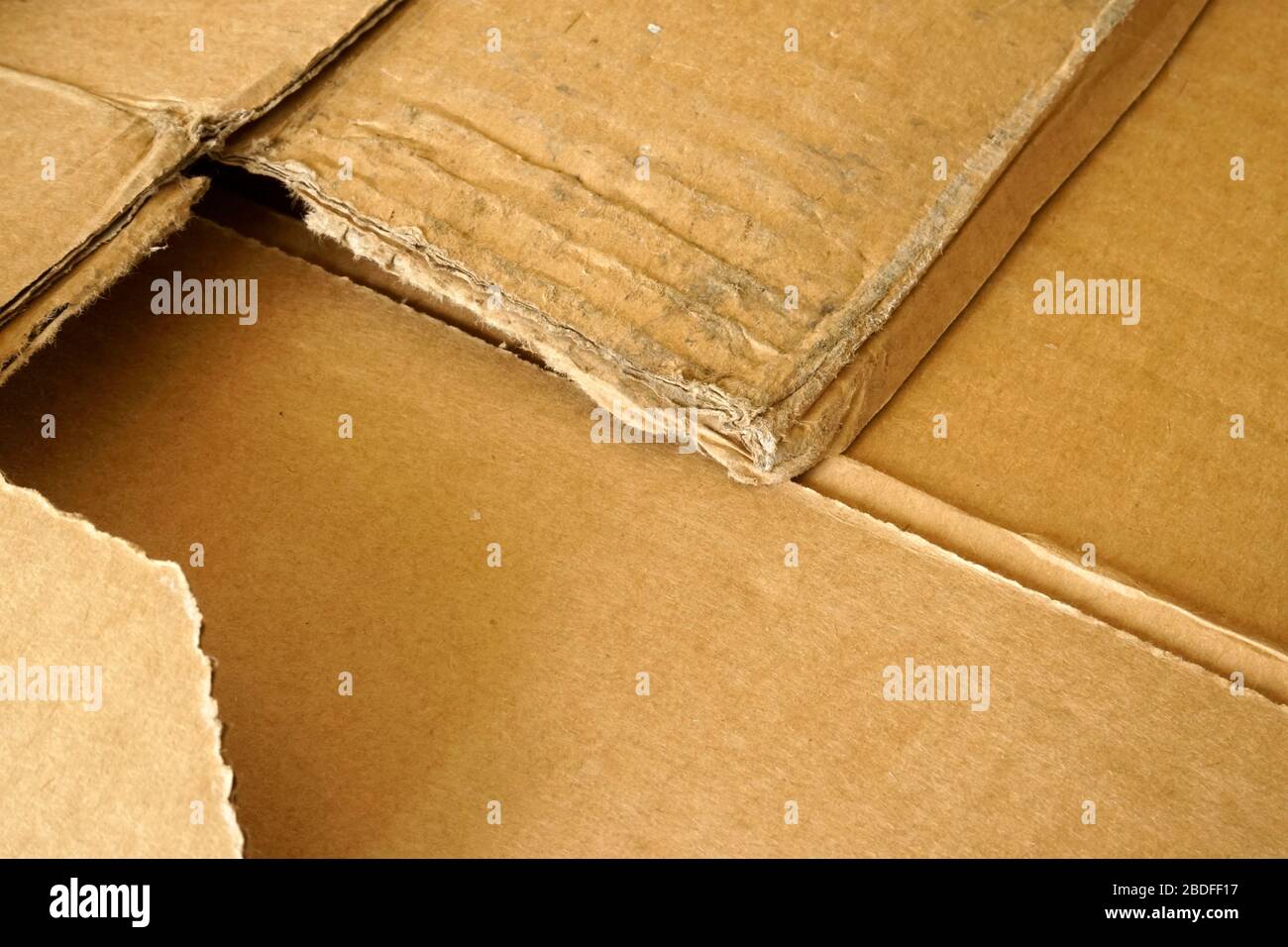 Sheets of brown corrugated cardboard stacked. Packaging material Stock ...