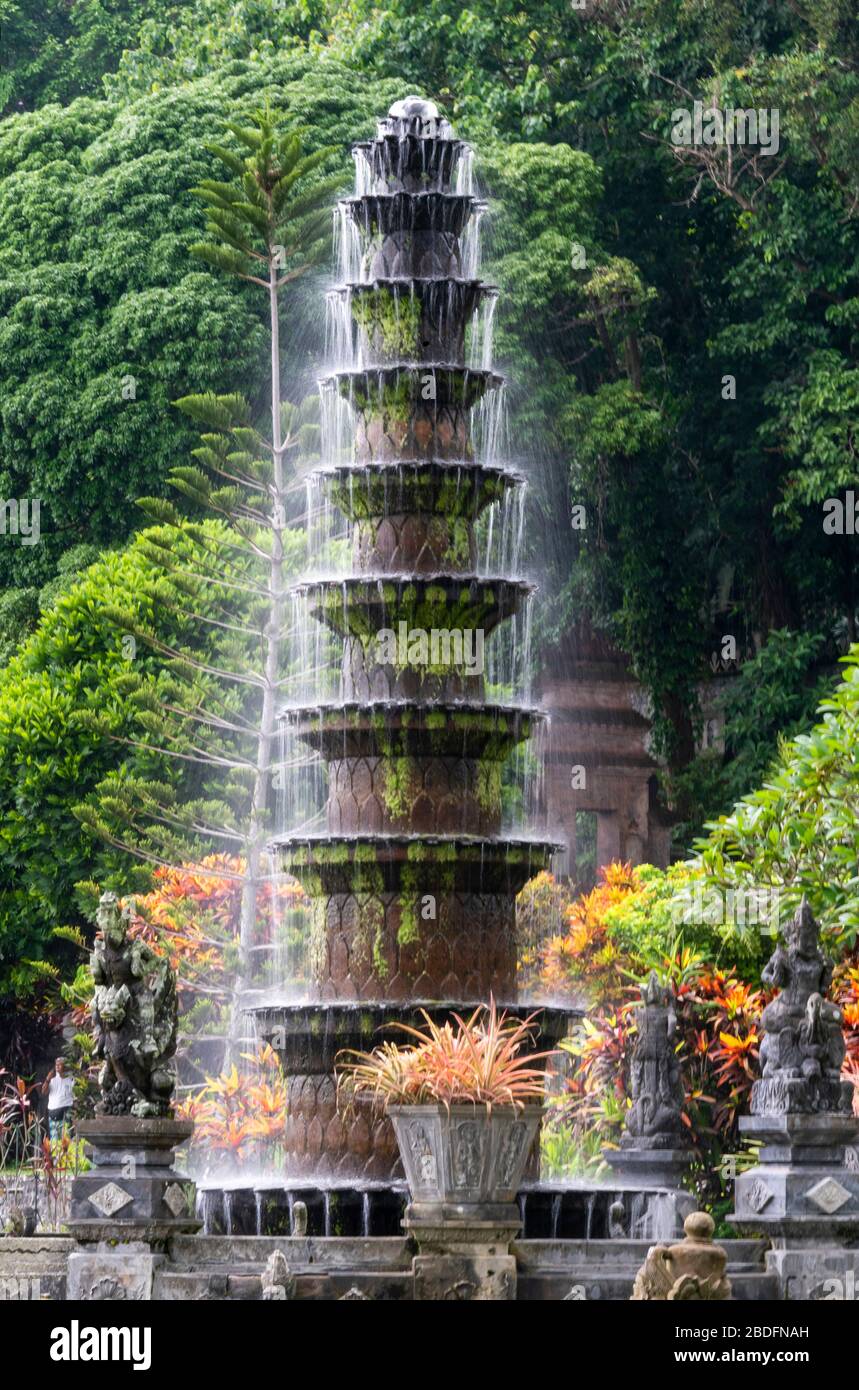 Vertical view of the waterfall tower at Tirta Gangga water palace in ...