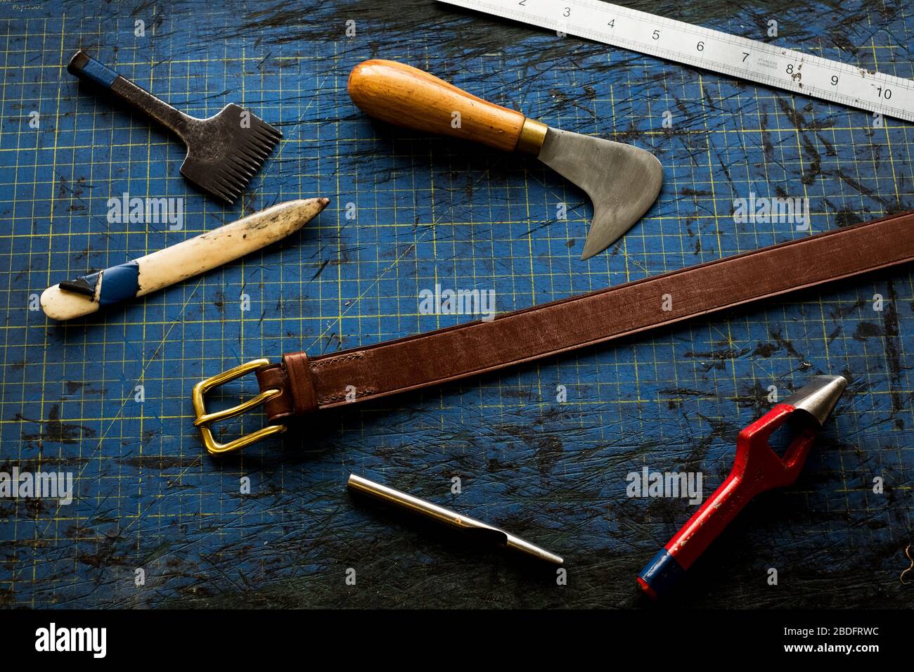 High angle close up of selection of saddle making hand tools Stock ...