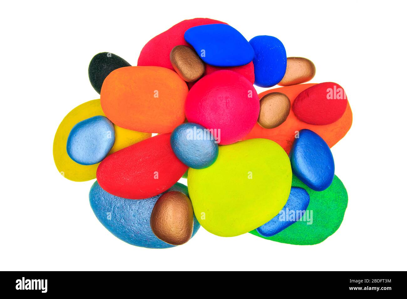 Group of multi coloured painted stones isolated on a white background ...