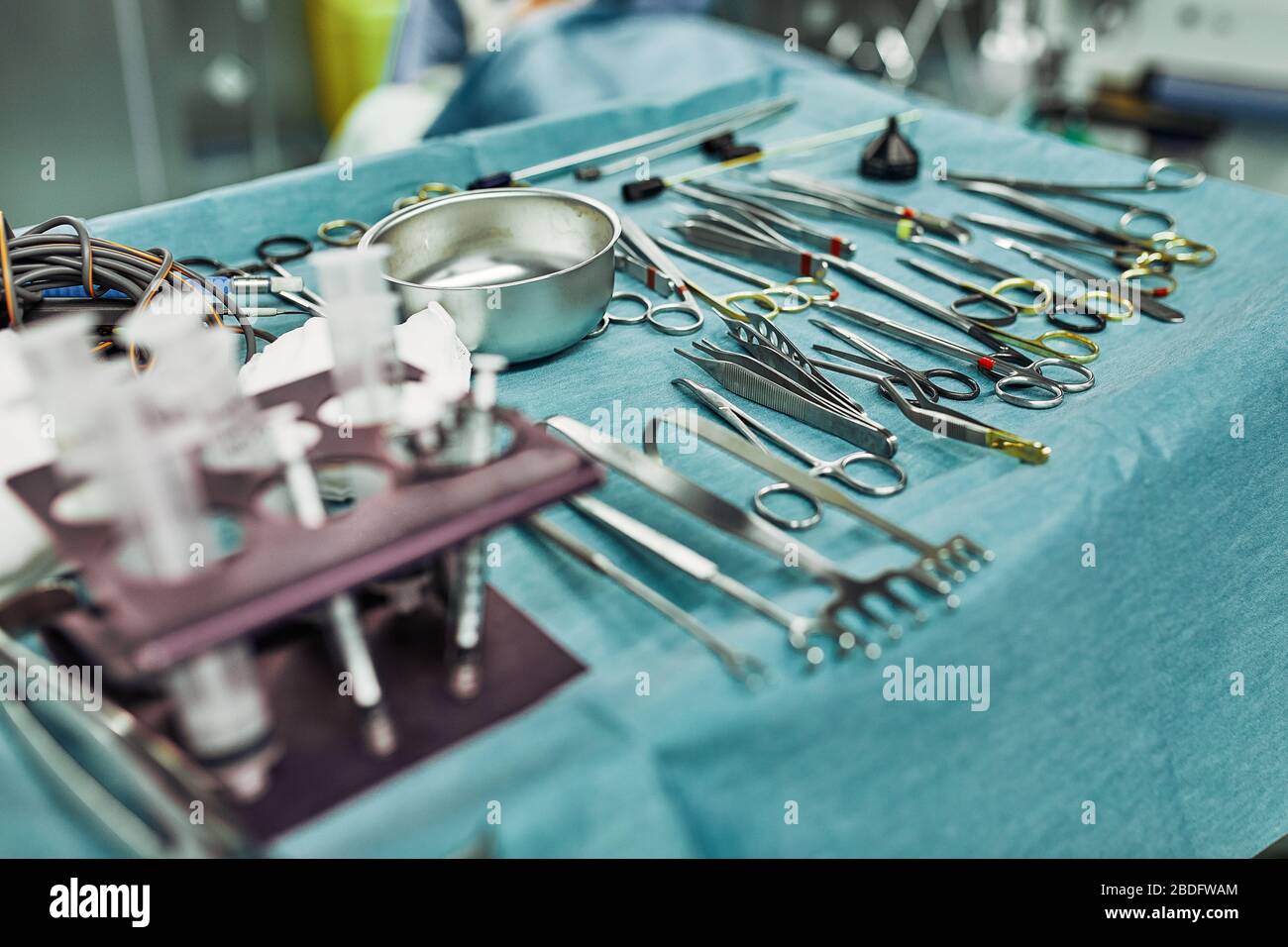 Surgical instruments in the operating room, laid out on a sterile table ...