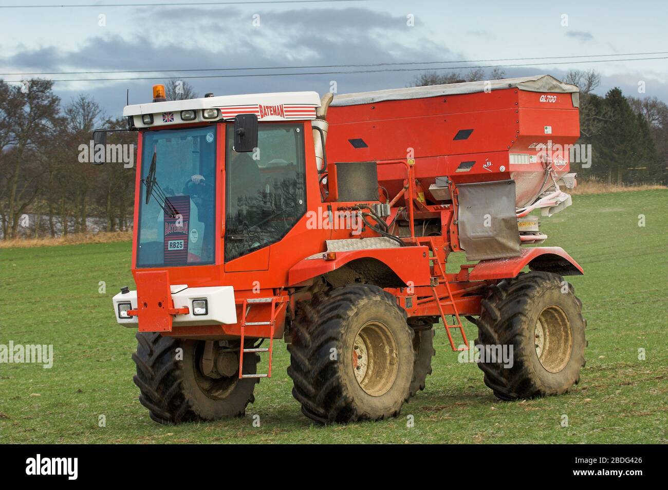 Bateman RB25 fitted with a fertliser spreader applying nitrogen to a ...