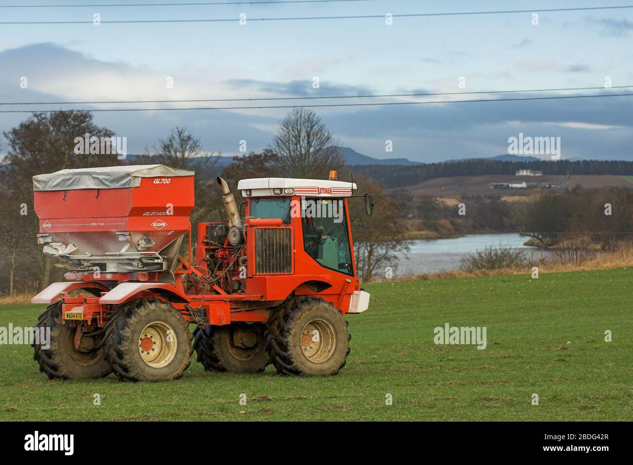 Bateman RB25 fitted with a fertliser spreader applying nitrogen to a ...