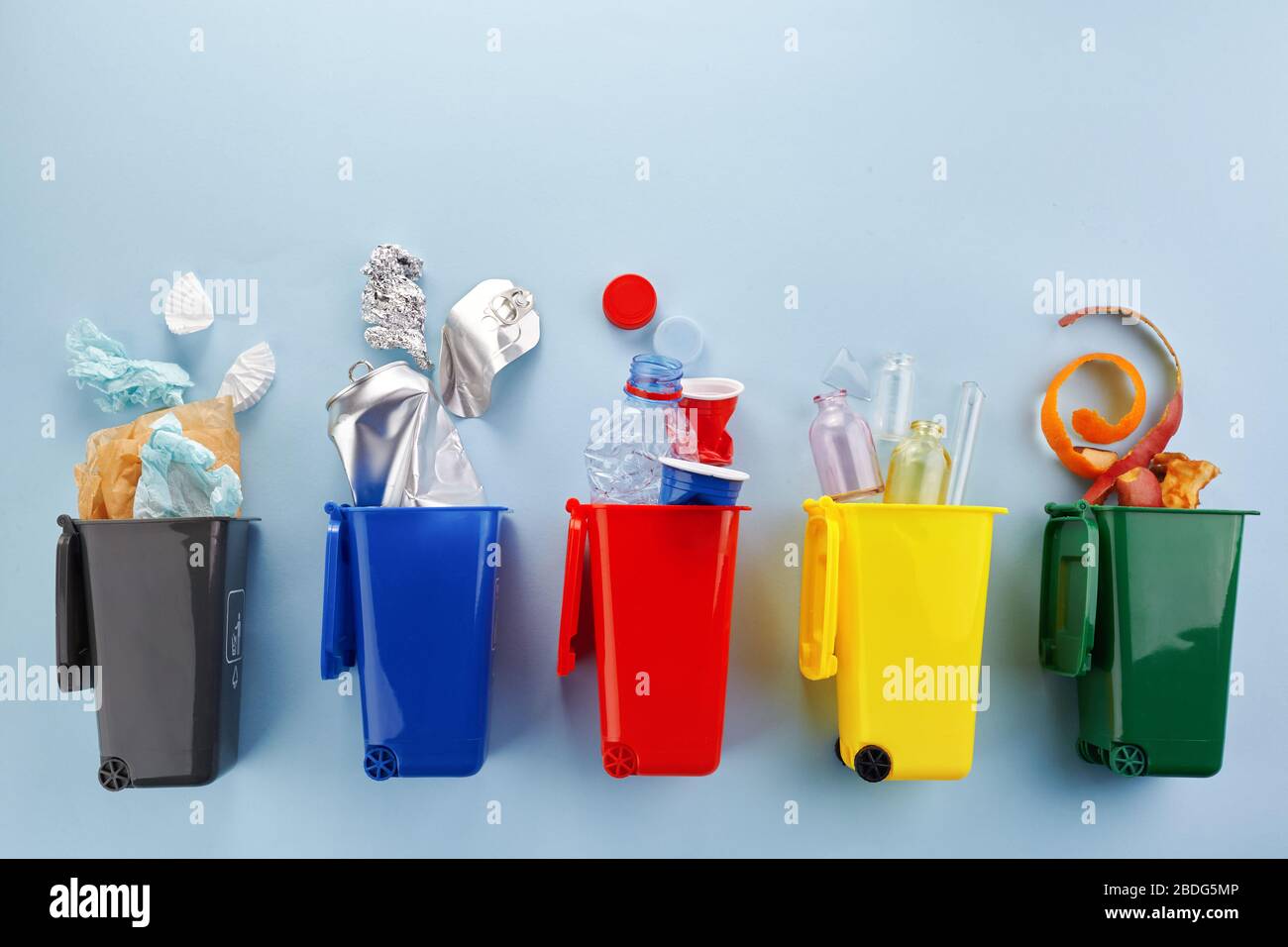 Garbage recycling in flat style on blue background. Garbage collection ...