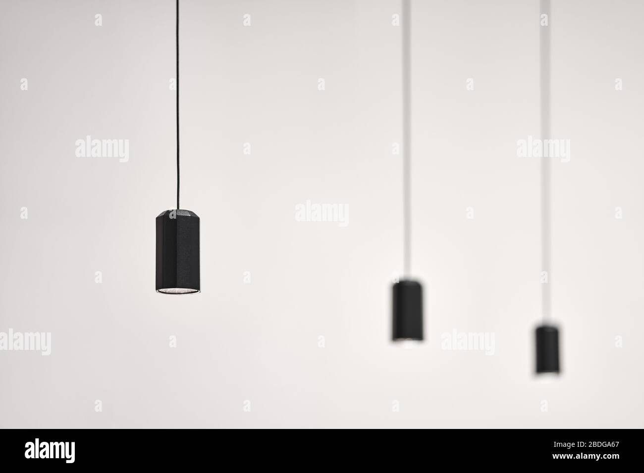Row of hanging lamps hi-res stock photography and images - Alamy