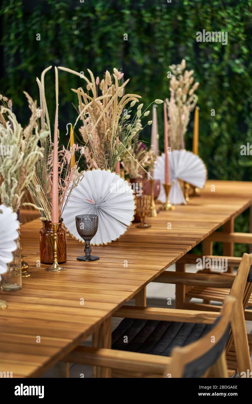 Closeup view at wood table with fancy serving Stock Photo - Alamy