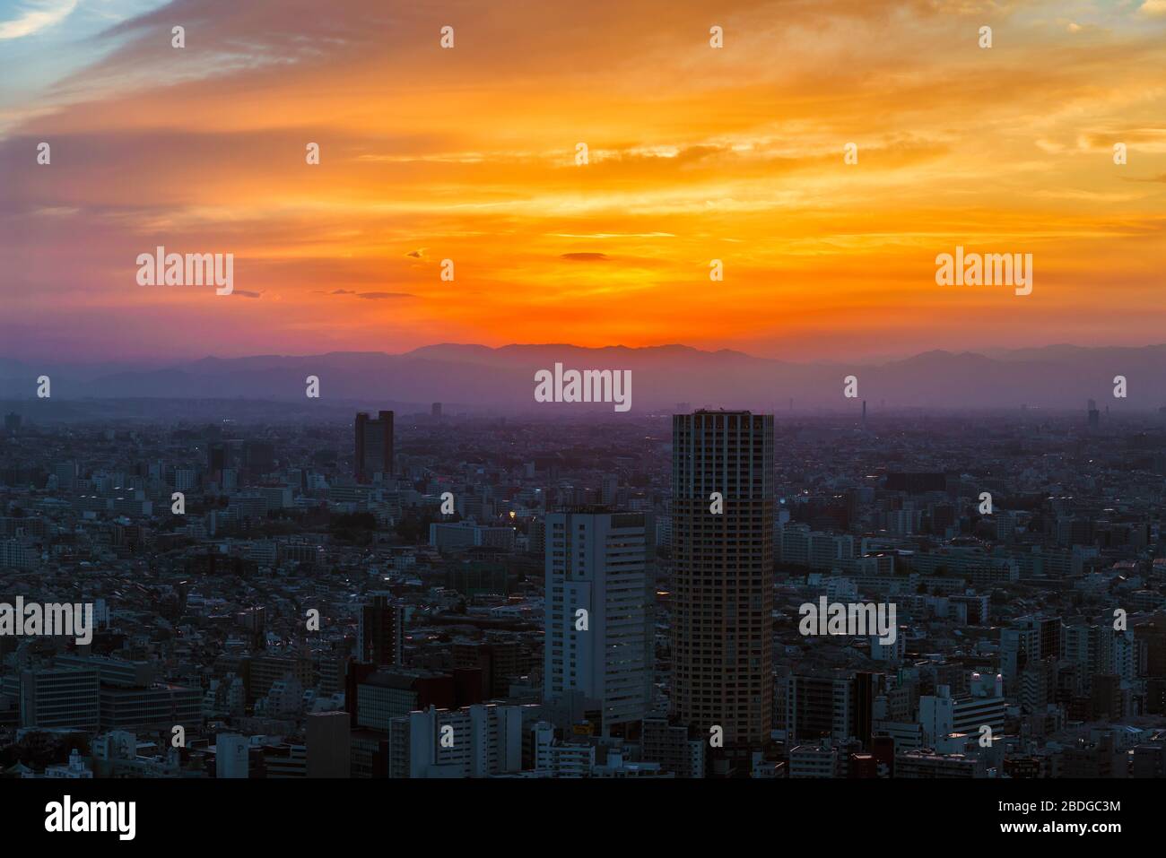 Sunset view of city endless suburbs of Meguro, Setagaya and Kawasaki ...