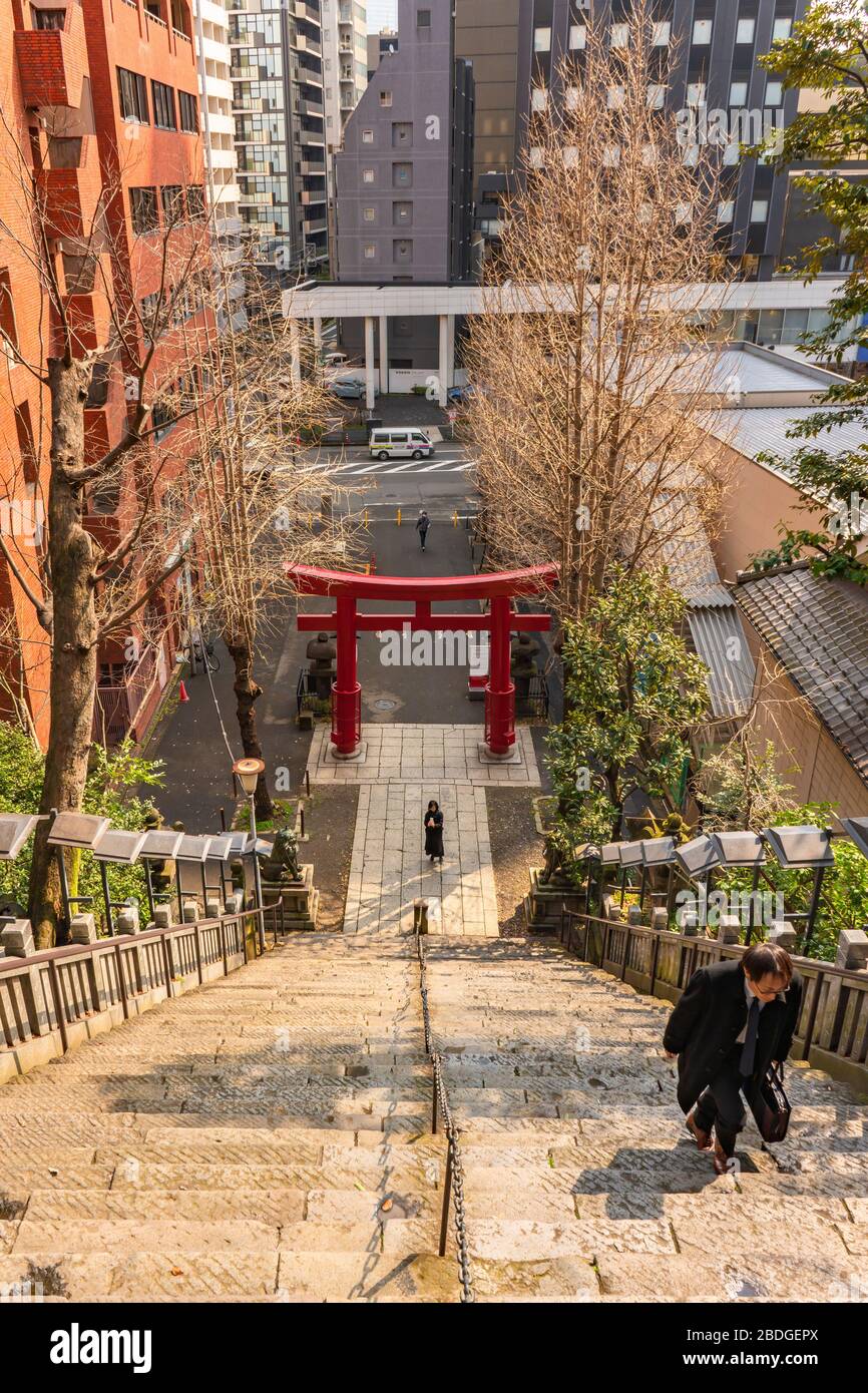 tokyo, japan - march 05 2020: High angle view of a salaryman climbing ...