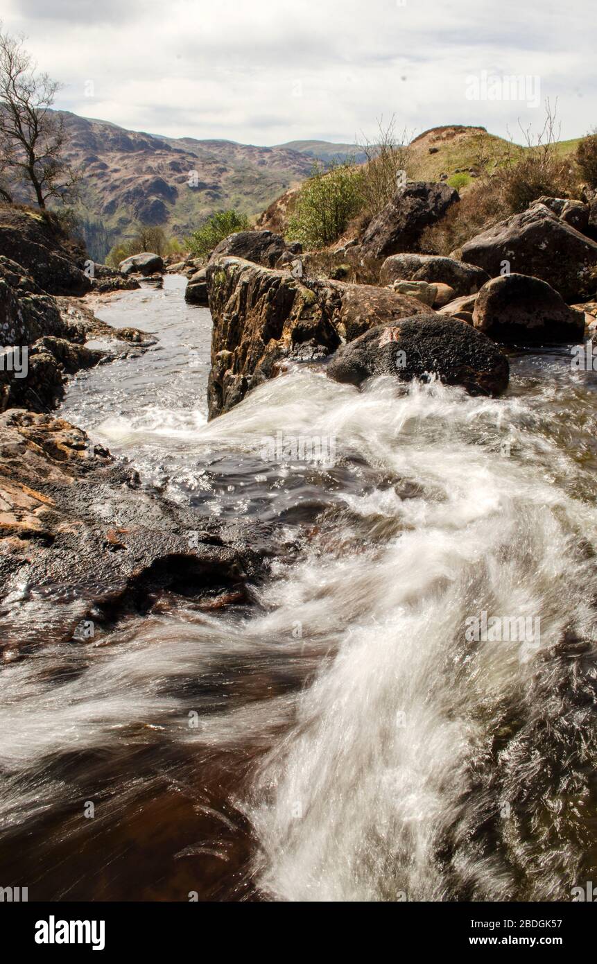 Water from Stream flowing Over Rocks Stock Photo - Alamy