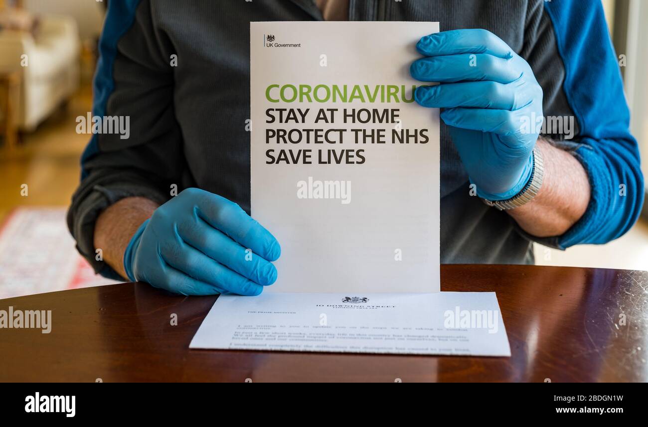 Hand holding pamphlet hi-res stock photography and images - Alamy