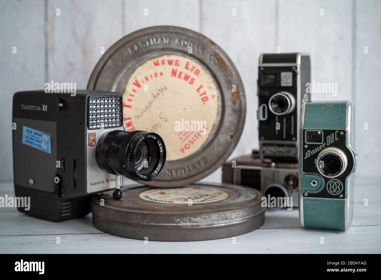 Old 35mm film canisters and vintage 8mm cine / movie cameras - still ...