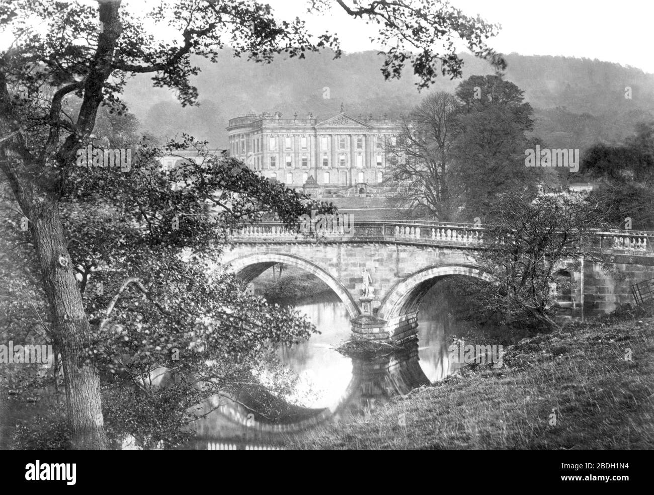 Chatsworth House, and Bridge (through trees) c1867 Stock Photo - Alamy