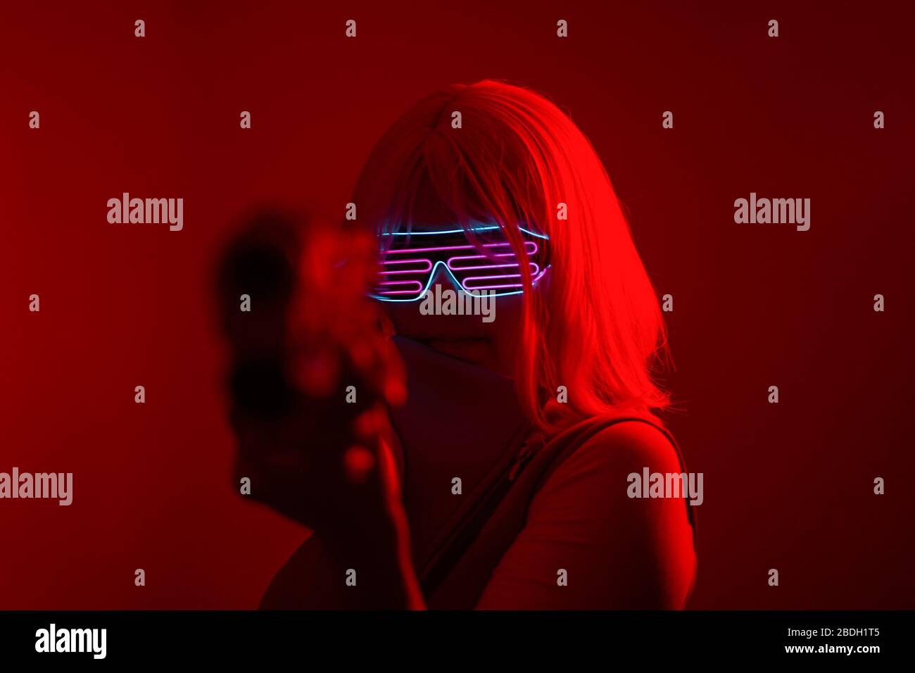 Girl with blaster in the futuristic battle. Concept virtual reality ...