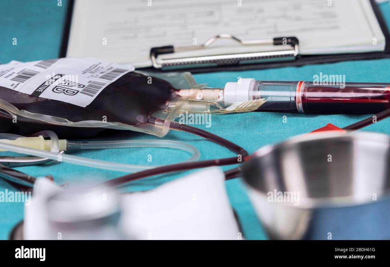 Empty blood Bag next to dropper, conceptual image Stock Photo - Alamy