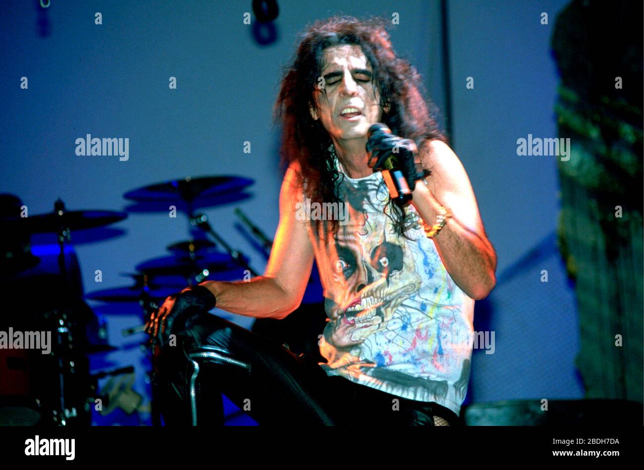 Alice Cooper performing live in 1990. Credit: Scott Weiner/MediaPunch ...