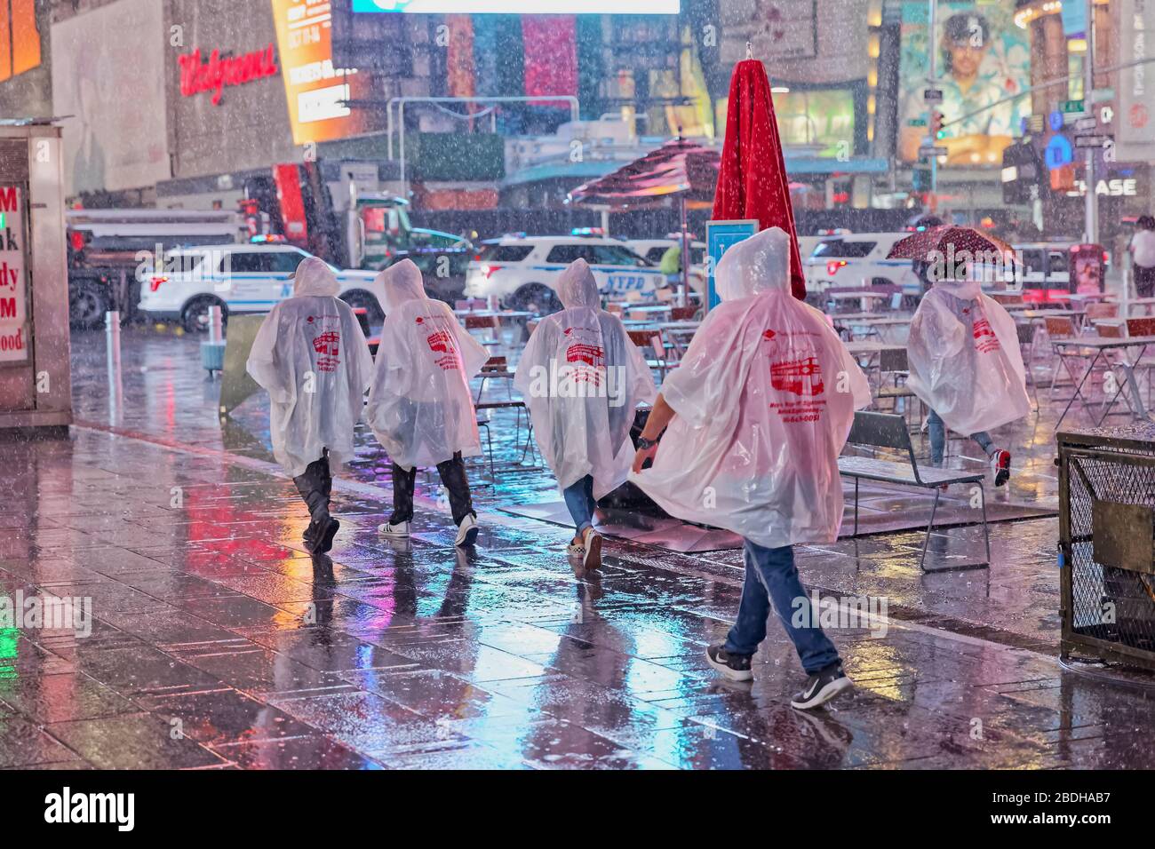 Rain on Times Square in New York Stock Photo - Alamy