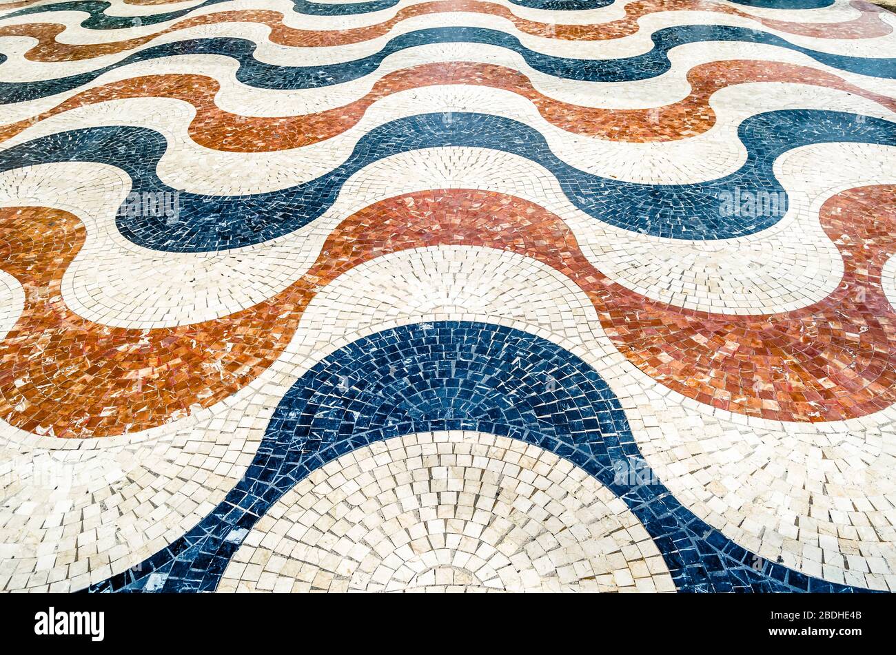 Colorful cobblestone pavement in Alicante, Spain, textured background ...