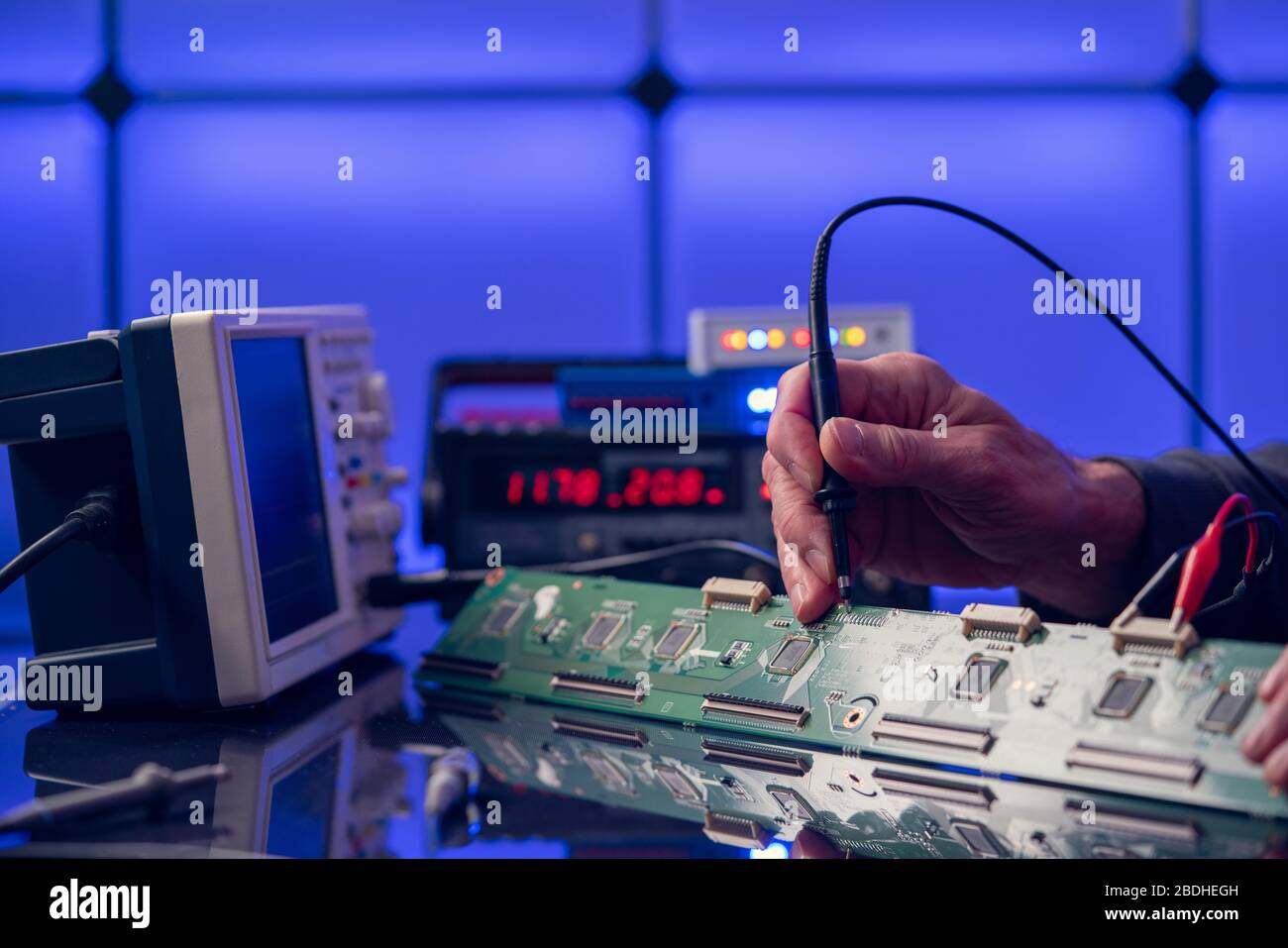 Debugging electronics device. PCB witch microcontroller in electronics laboratory Stock Photo ...